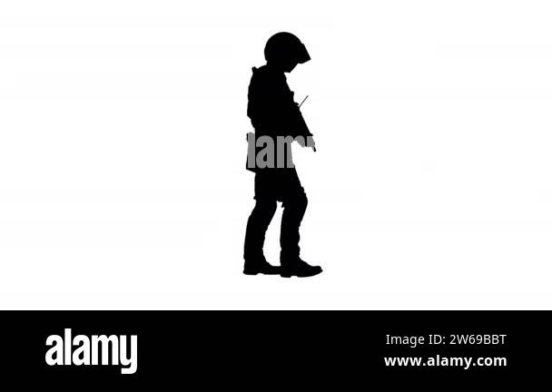 Silhouette Swat operator with assault rifle walking Stock Video Footage ...