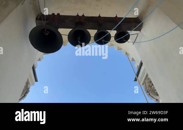 Church bells. Exterior of Bells ringing for temple service notification ...