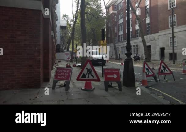 Static view of Work in progress and Footway Closed Ahead sign boards ...