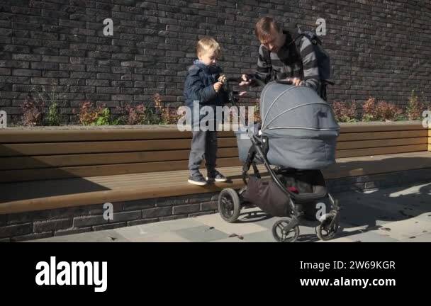 Father child baby buggy Stock Videos & Footage - HD and 4K Video Clips ...