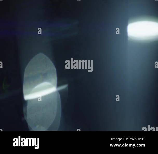 Techy blue optical lens flares transition that is a seamless loop with ...