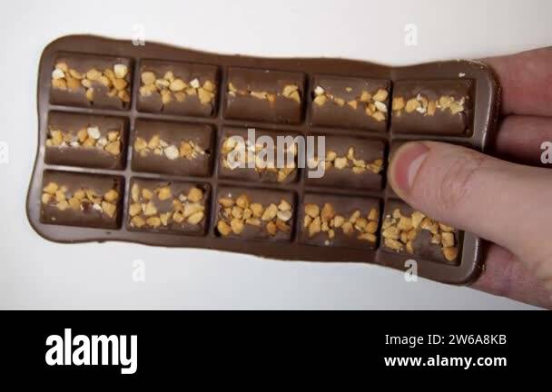 Breaking chocolate bar on Stock Videos & Footage - HD and 4K Video ...