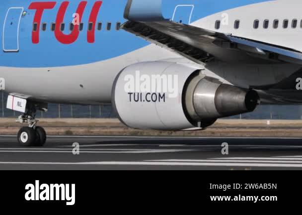 Close up, Turbine engine of the Boeing 767 Airplane taking off of the ...