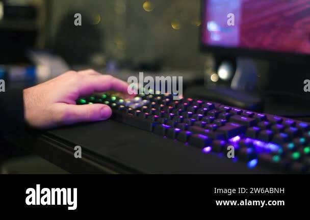 Man using multi colors computer keyboard Stock Video Footage - Alamy