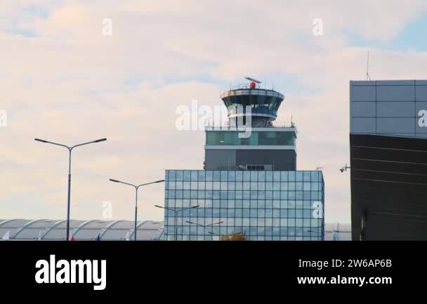 Functioning airport control tower with transparent booth. Air transport ...