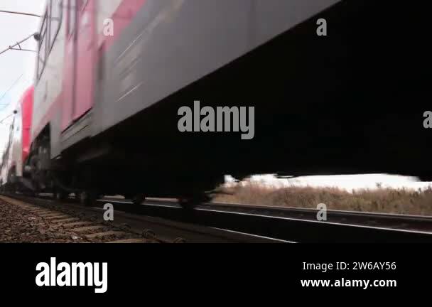 Suburban train on the railroad loopable and seamless. Passenger public ...