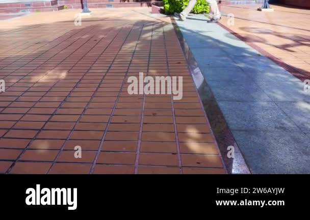 Video of people leg walking across landscaping material floor. Urban ...