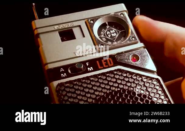 Vintage AM FM radio transistor device from 1970s, tuning for stations ...