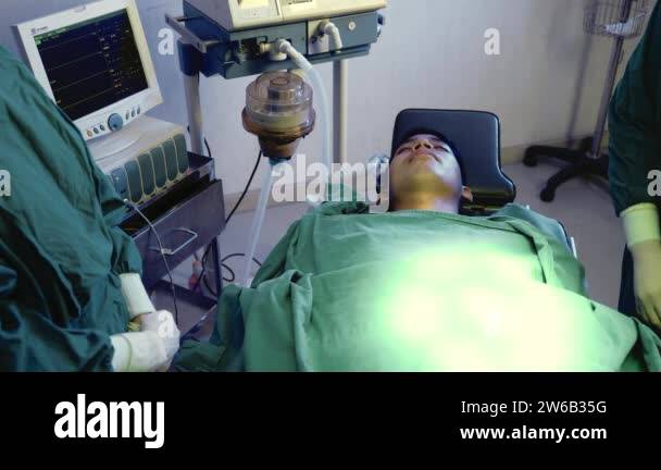 Dead patient surgeon doctor covering face on bed finished operate ...