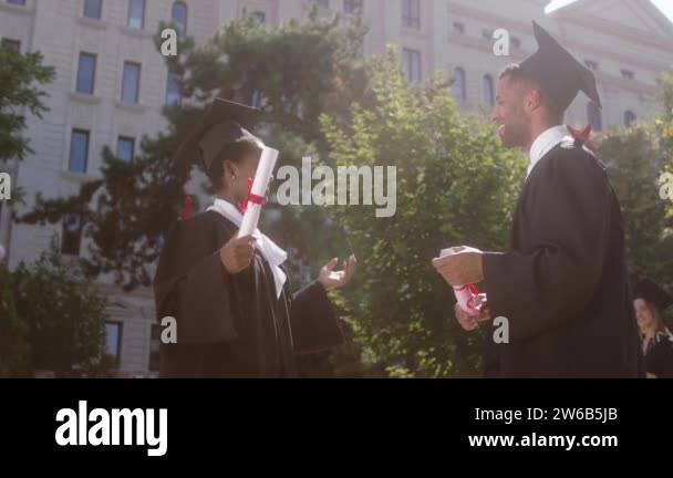 Graduation concept two charismatic young students black looking man and ...