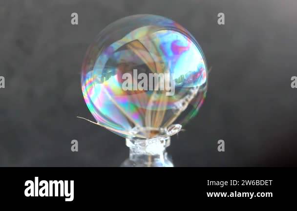 Interference of light in a bubble film.The changing thickness of the ...