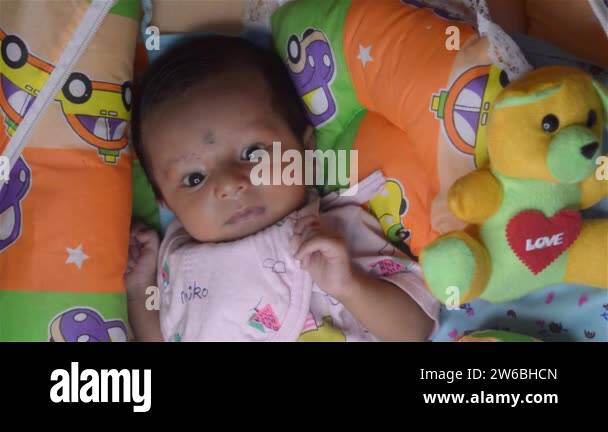 Newborn Baby yawning after waking up. Close up portrait of cute Sweet ...