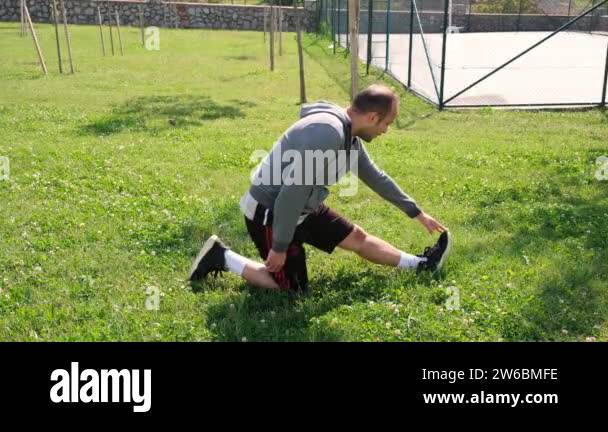 Hamstring man stretch warm Stock Videos & Footage - HD and 4K Video ...