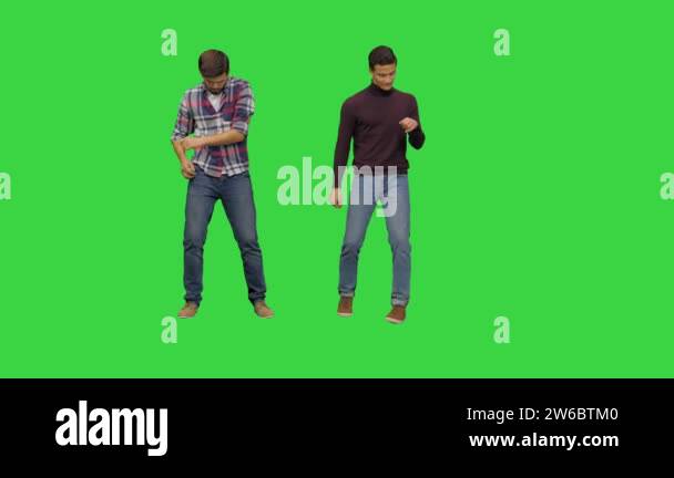 Two young men dancing in a funny awkward way on a Green Screen, Chroma ...