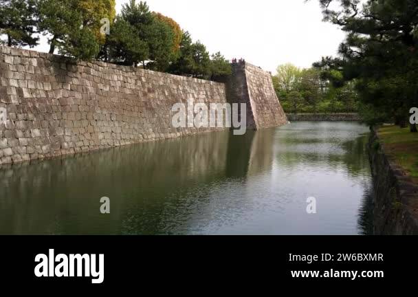 defensive stone wall and moat at nijo castle in kyoto Stock Video ...