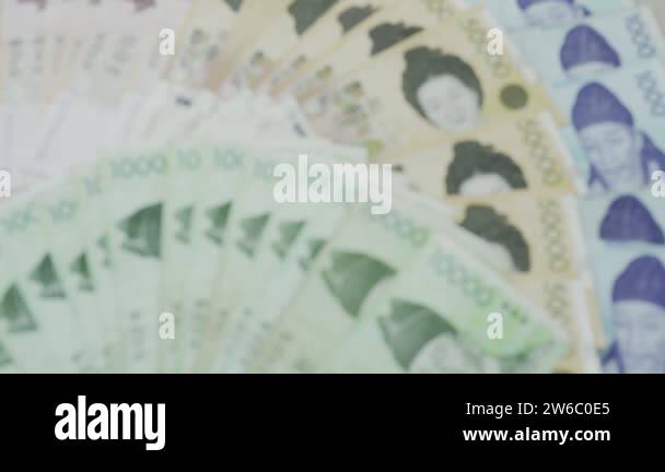 Korean currency , Many Korean bank notes Placed on the table.The won is ...