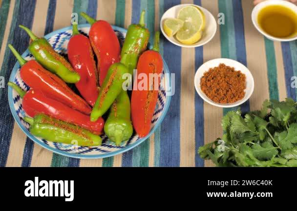 Rajasthani Mirchi Ka Achaar / stuffed chili pickle placed on a colorful ...