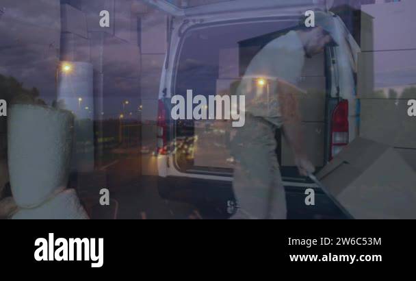 Animation of road traffic over delivery man loading boxes onto van in ...