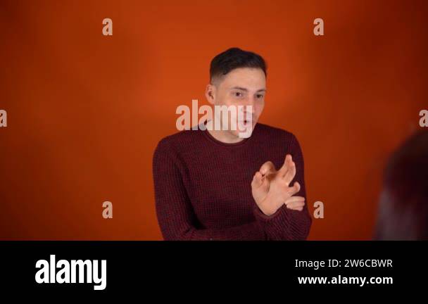 Crop person slapping scared man in face. Emotional male getting slapped ...