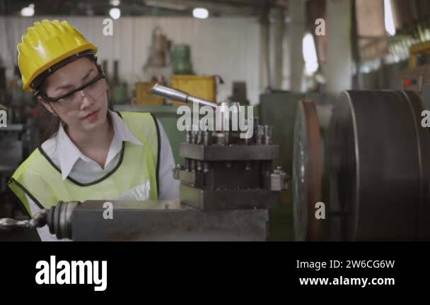 Asian professional mechanical engineer or operation woman wear uniform ...
