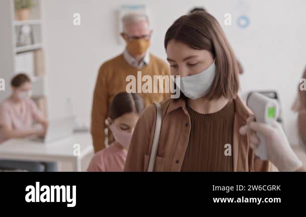 Medium Steadicam of diverse hospital patients wearing protective face ...