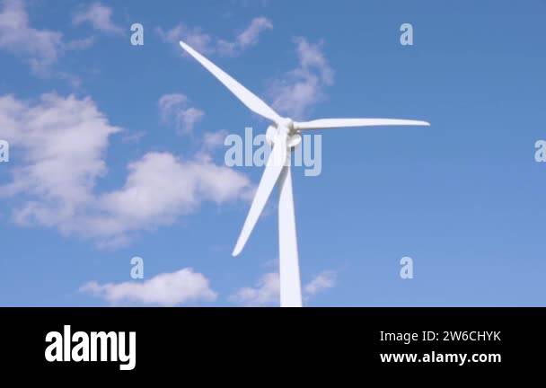 Wind power station with clear blue sky background. Wind turbine at ...