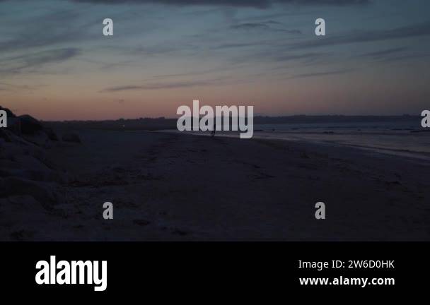 Ocean ebb theme in northern france in brittany region. Man tourist ...