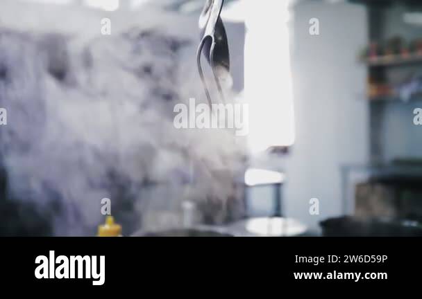 cooking. steaming food. buffet restaurant kitchen. Close-up. food is ...