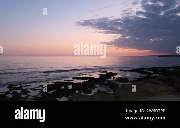 Romantic pink reflection of the sun in the Mediterranean Sea on the ...