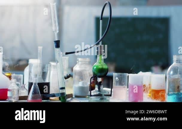 Scientist laboratory experiments table full of chemical reaction ...