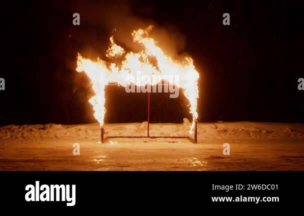Carcass of hokey gate in burning flame on ice arena Stock Video Footage ...
