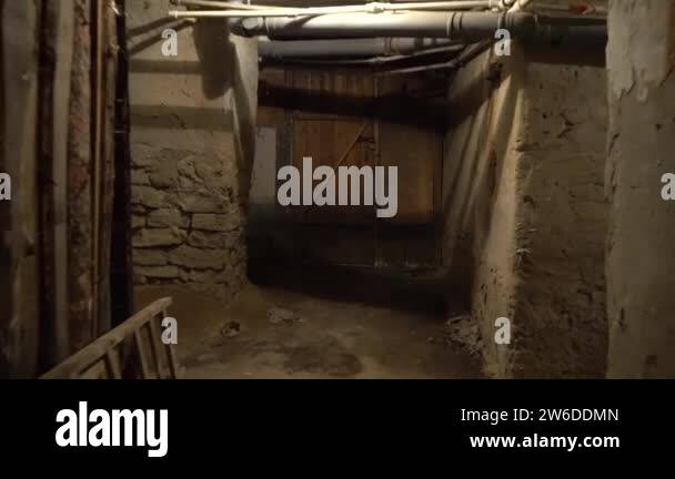 Walk through an old dark underground basement or a closet in an old ...