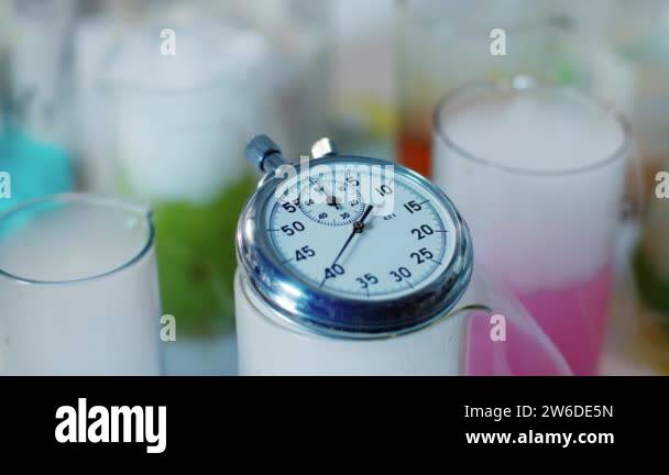 Taking video closeup of a stopwatch using for experiment in the ...