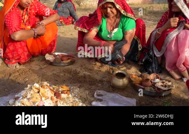 Hindu cultured women in traditional Rajasthani attire. Female offering ...