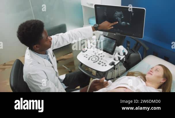 Ultrasound concept. Top angle view of young Caucasian pregnant woman ...