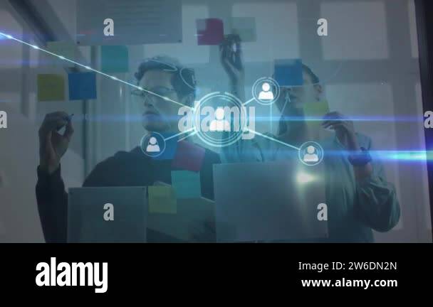 Animation of network of people icons over male and female colleague ...