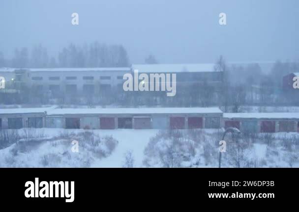 Blizzard and heavy snowfall on the outskirts of the city. Low ...