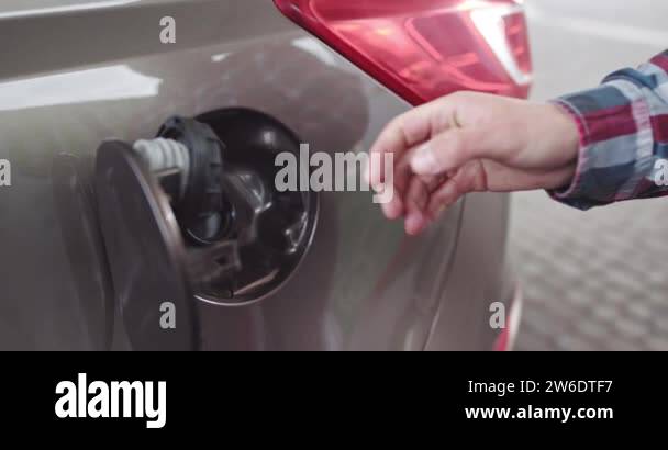 Close-up Of A Man Fueling With Diesel In A Car At A Gas Station. Full ...