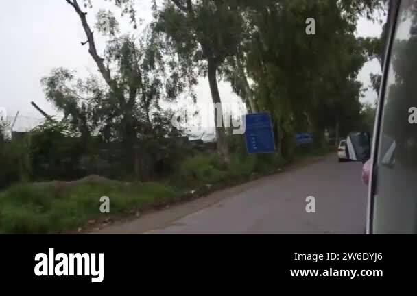 Rear View Window While Driving Past Trees - Slide - Left To Right Stock ...