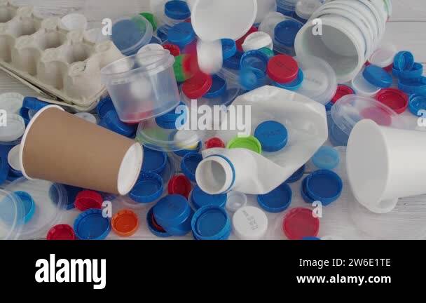 Used plastic drink bottle caps and lids sorting for recycling ...