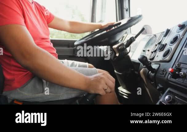 Male arm is shifting gears in manual transmission while riding a car ...