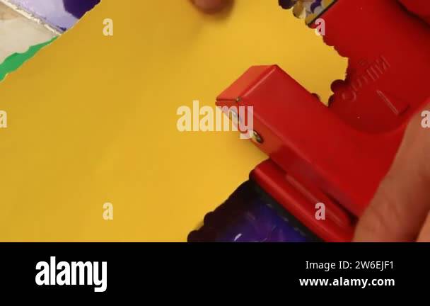 Paper punching Stock Videos & Footage - HD and 4K Video Clips - Alamy