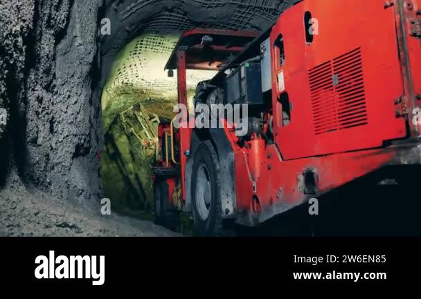 Massive boring machine working in the underground mine. Underground ...