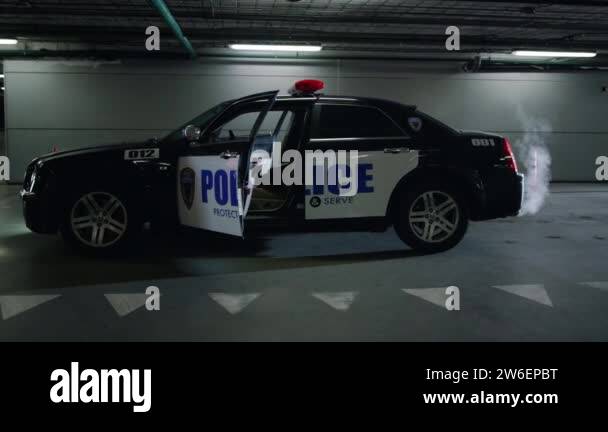 Police car parking at construction building. Patrol vehicle with open ...
