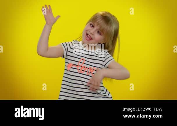 Funny child kid girl making playful silly facial expressions and ...