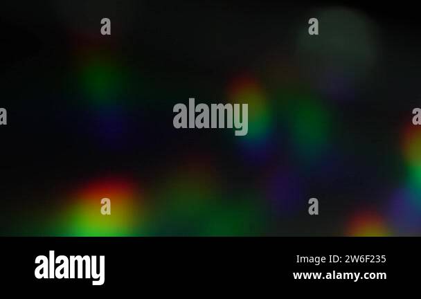 Iridescent lens flare. Refraction of a light beam through a crystal ...