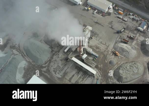 Drone view orbit around the central establishment of Colas in Iceland ...