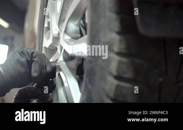 Mechanic fastening wheel car Stock Videos & Footage - HD and 4K Video ...