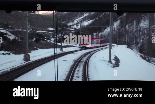 Zermatt Shuttle train in the Swiss Alps, drivers view Stock Video ...