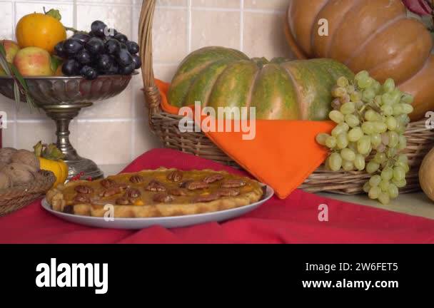 Thanksgiving day. Harvest festival. On the table there is a pumpkin pie ...